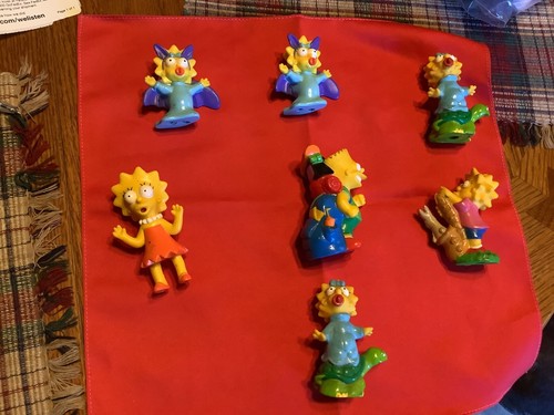 Bart Simpson and Lisa figures from 1990. 7 figures total. colors bright ...