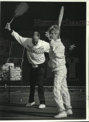 1991 Press Photo Lester Sack Teaches Mrs. Herbert Van Horn Tennis ...