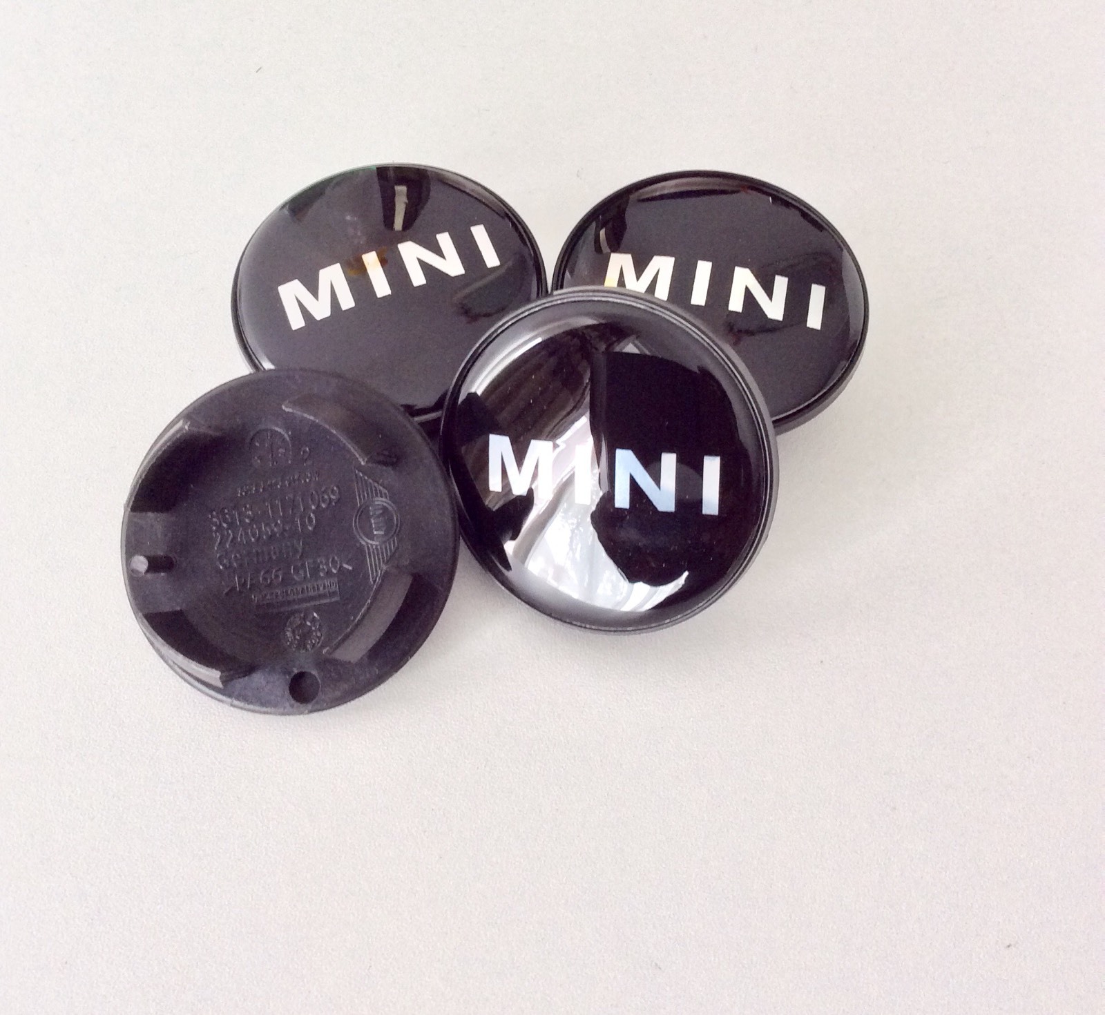 MINI CENTRE CAPS WHEEL HUB 4 X SET ALLOY BADGE EMBLEM BLACK 54mm COOPER ...