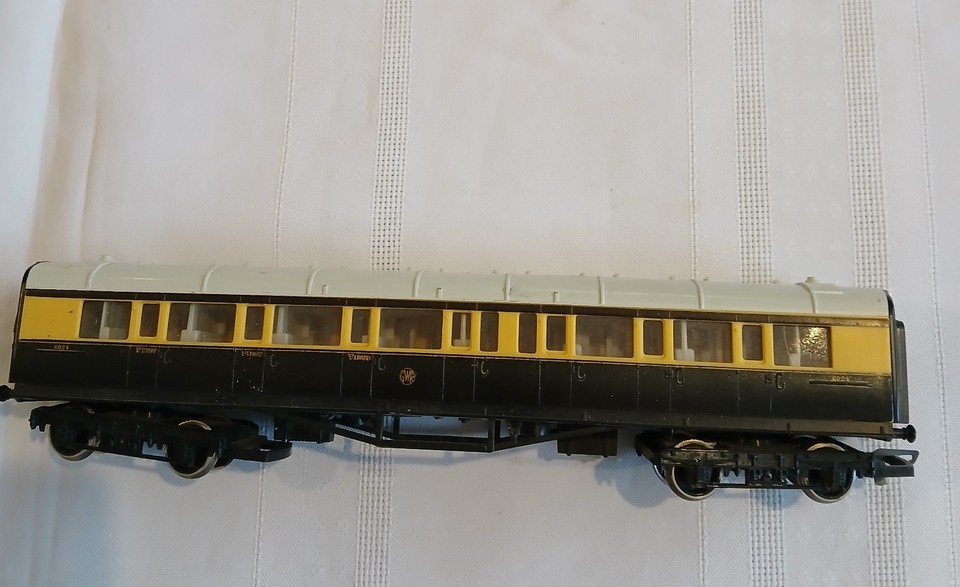 Hornby carriages, 3 x LNER and one vintage looking First Class carriage ...