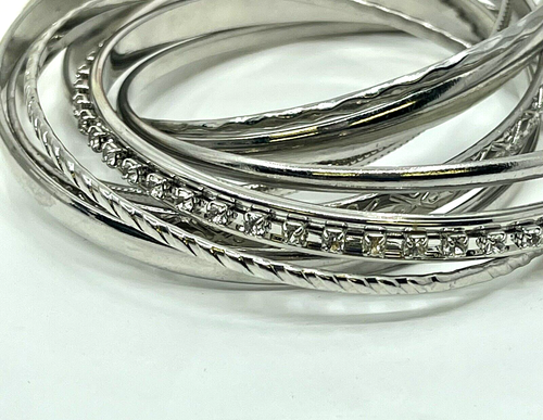 Bangle Bracelets Silver Tone Stack of 8 Connected Nice Bangle Bracelets ...