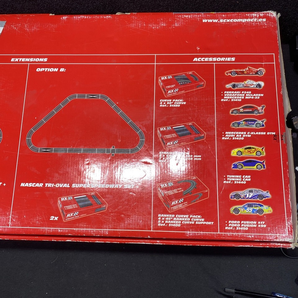 SCX Compact Nascar Tri-Oval Speedway 1:43 Slot Racing Set 2 Curves Are ...