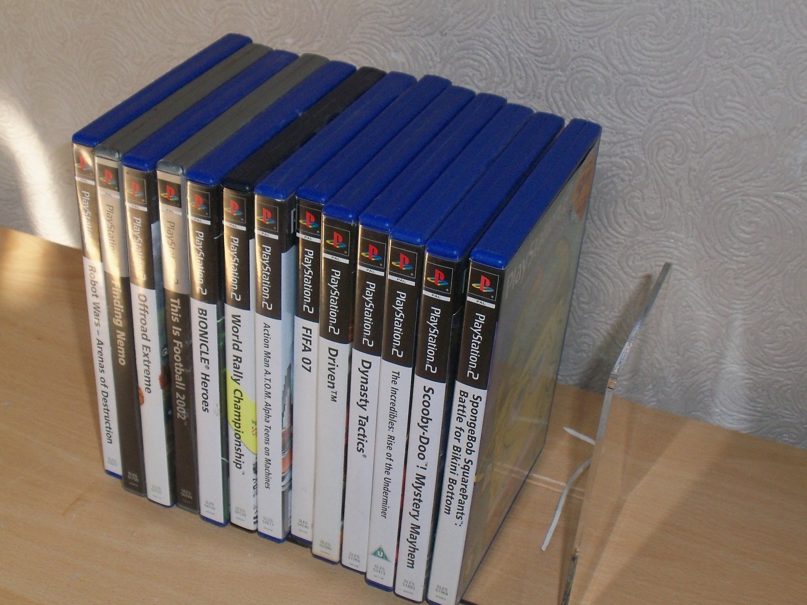 PAIR OF CLEAR ACRYLIC BOOKENDS / DVD / VIDEO GAME / CD SHELF SUPPORTS ...