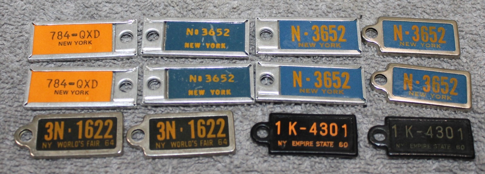 VINTAGE LOT OF 12 LICENSE PLATE KEY CHAINS TAGS DISABLED VETERANS NEW ...