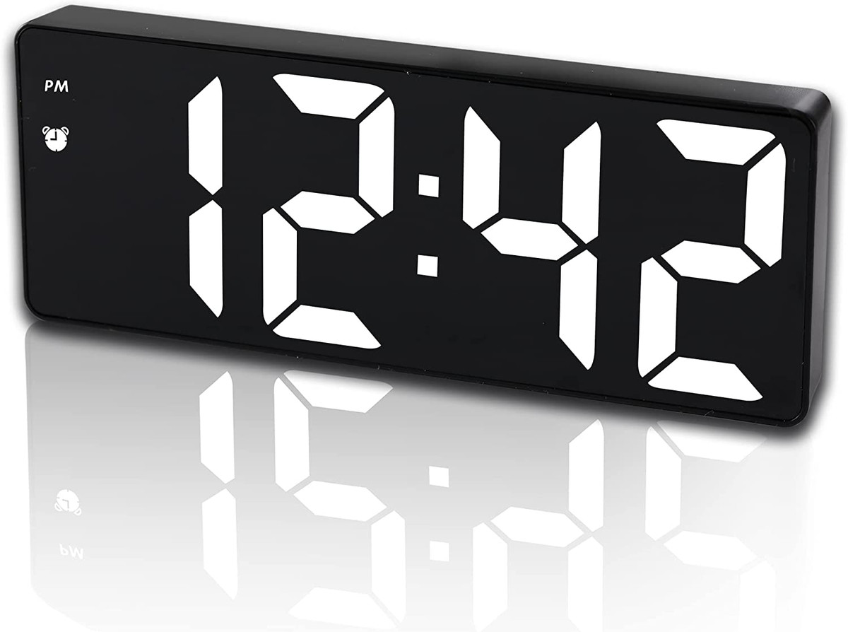 Digital Alarm Clock On Nightstand