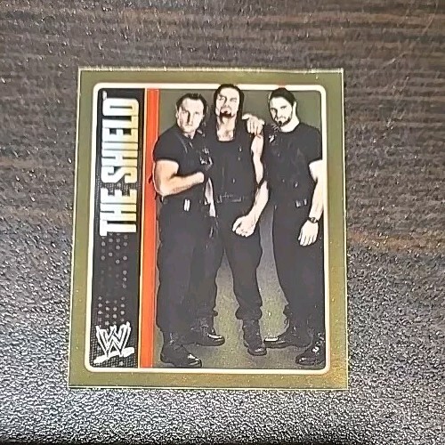 2013 WWE Topps Icons Stickers The Shield Rookie RC #149 Gold Foil ...