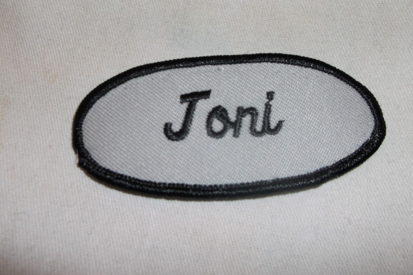 JONI USED EMBROIDERED VINTAGE SEW ON NAME PATCH TAG OVAL BLACK ON GREY ...