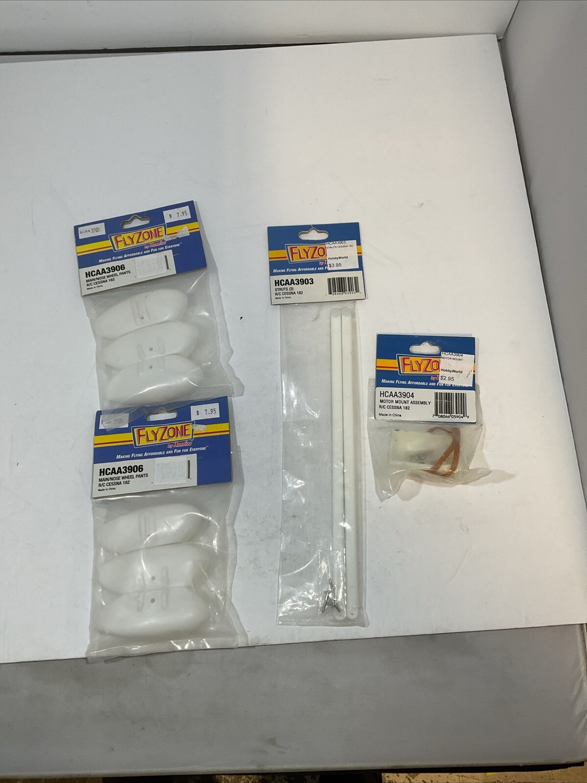 NEW LOT OF 4 FLYZONE CESSNA 182 R/C AIRPLANE PARTS HCAA3906, HCAA3903 ...