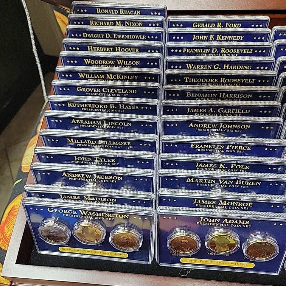 The complete U.S. presidential coins collection with a display case ...
