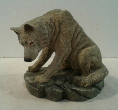 Large realistic "GRAY WOLF" sitting on a granite looking rock poly ...