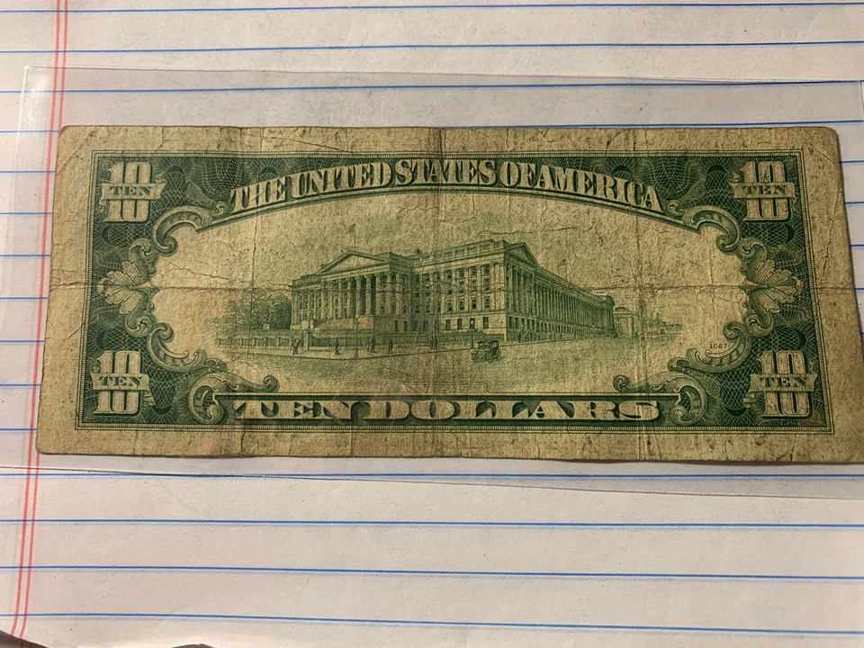 1934 A Series 10 Dollar Bill Misprint. The A is misaligned on the upper ...