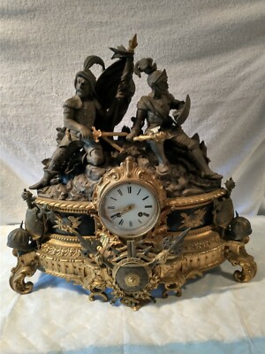 Antique French clock with knights in armor. About 18in. H 17½in W. 4in ...
