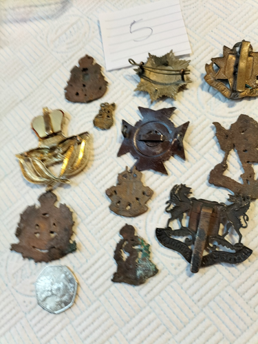 Collection of damaged military badges | eBay UK