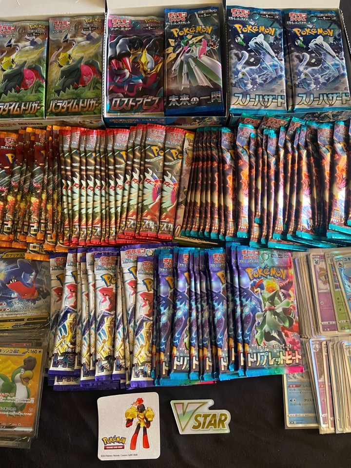 Pokemon Booster Pack Bundle - 4 Packs, Holo Cards, Ultra Rares + MORE ...