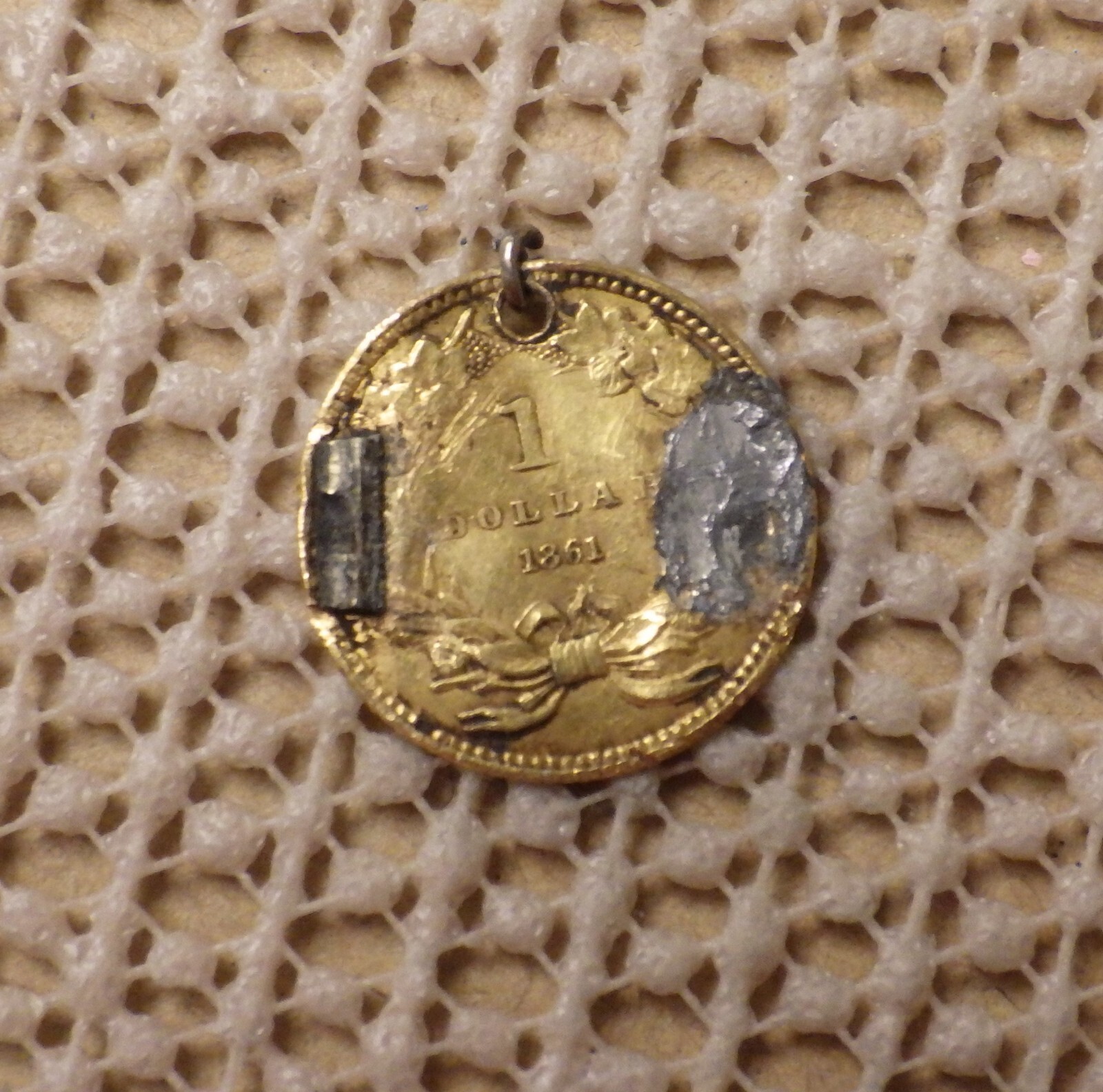 1861 U.S. $1.00 Gold Love Token, Yes - looks like been thru civil war ...