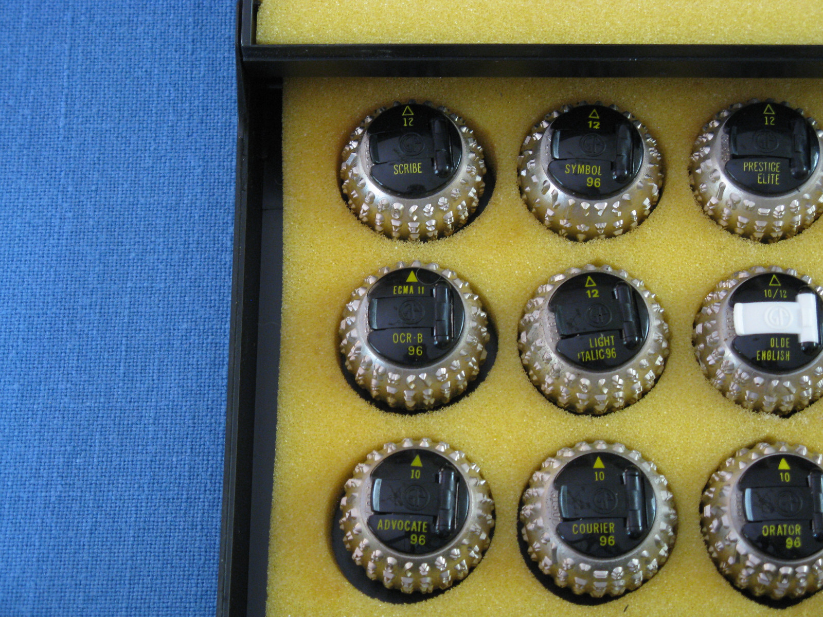 12 IBM SELECTRIC TYPEWRITER FONT BALLS IN STORAGE CASE | eBay