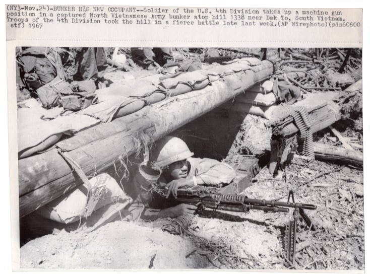 M 60 Vietnam U.S. Army M60 Machine Gunner In Front Of A Burning Hut;