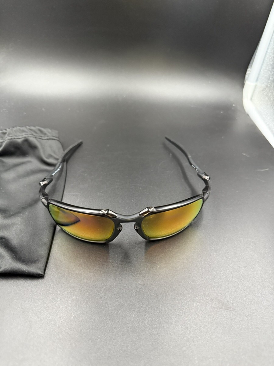 Oakley Badman Dark Carbon Ruby Iridium Polar Sun Glasses
