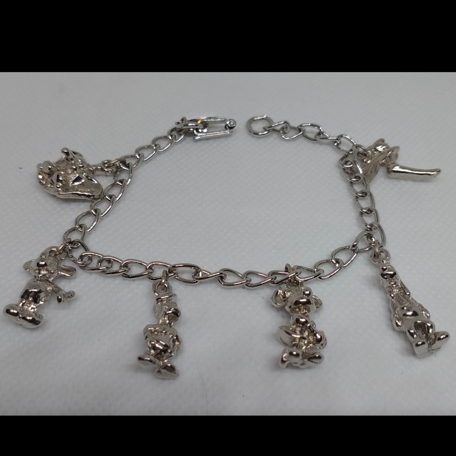 Walt Disney Characters Charm Bracelet tagged Mickey Mini Mouse Dumbo ...