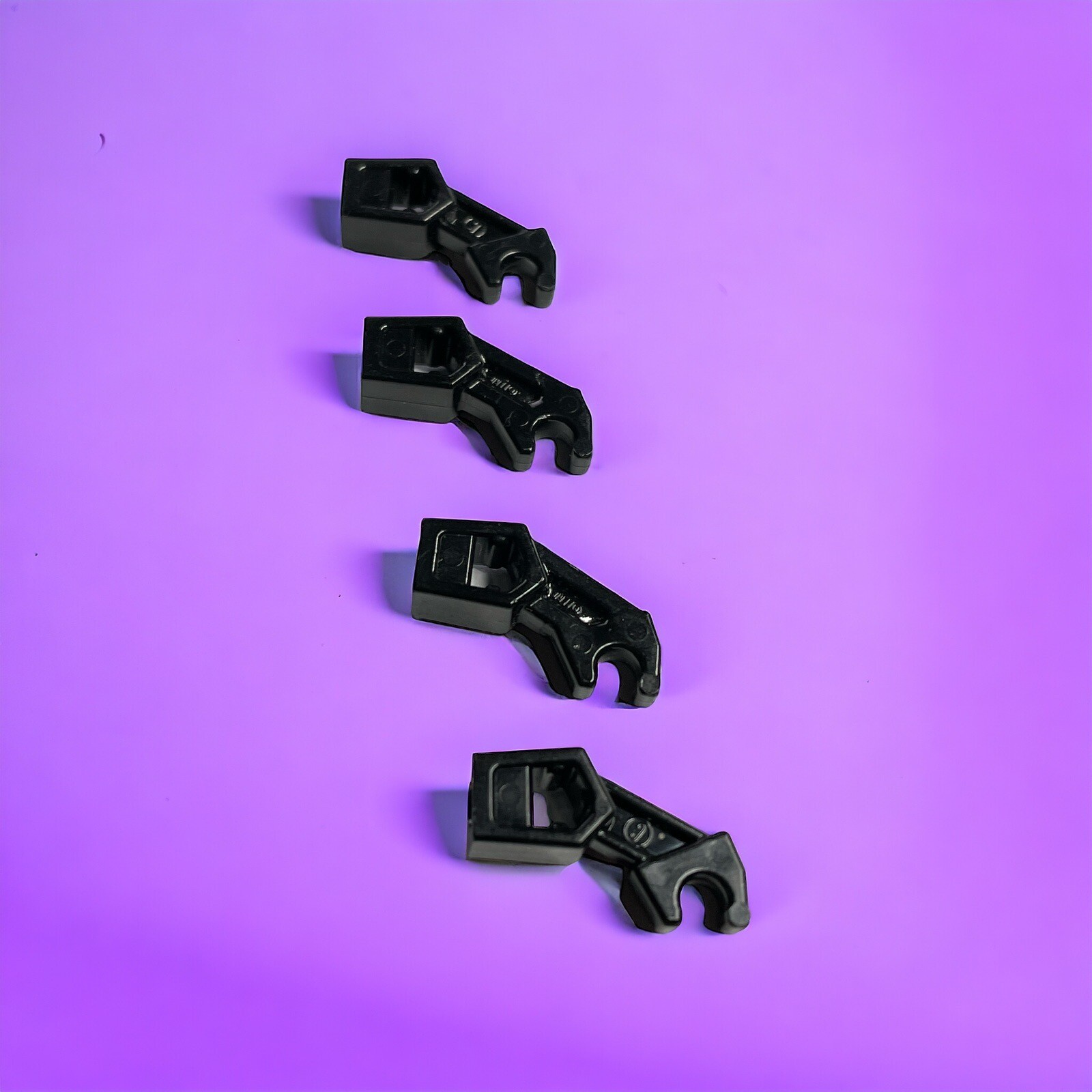 lot of 4 black Lego - special arm parts -as pictured- combined shipping ...