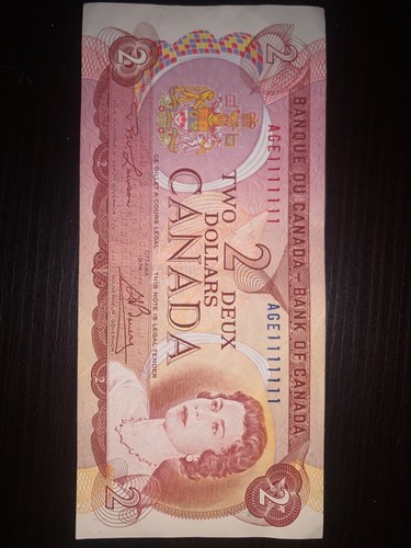1974 2$ canadian banknote unciculated with a rare low solid serial ...