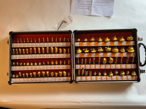 Case of router bits, set of 100 with allen key, barely used, may be new ...