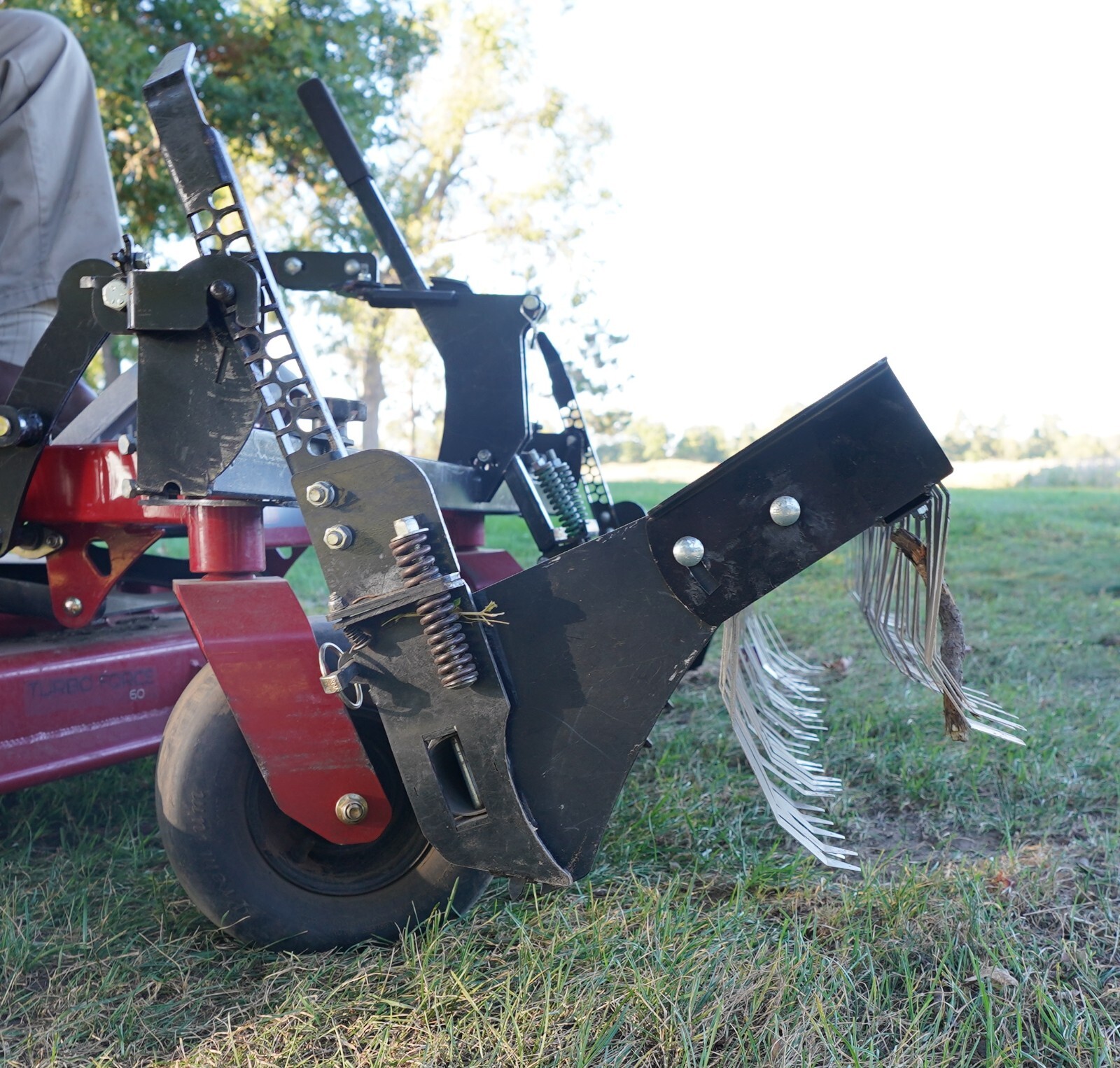 Swinging Tool Bar and Rake Ezra Lawn Care Equipment mounts on a zero ...