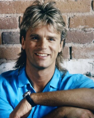 Richard Dean Anderson with big smile in blue shirt as TV's MacGyver ...
