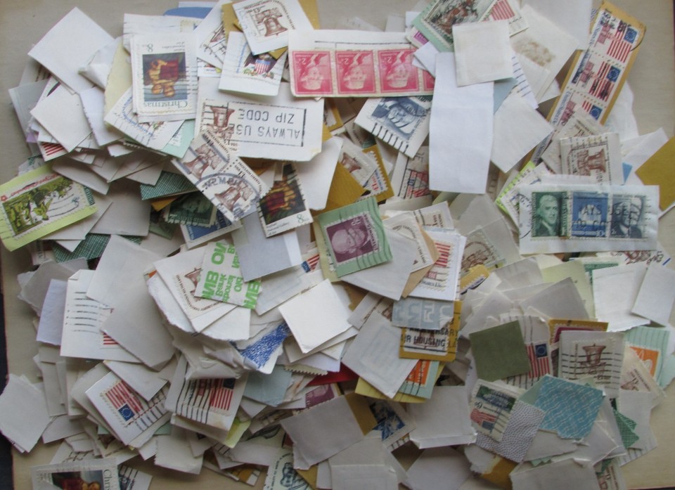 6 pounds of US postage stamps Box lot hoard on paper box filled to the ...