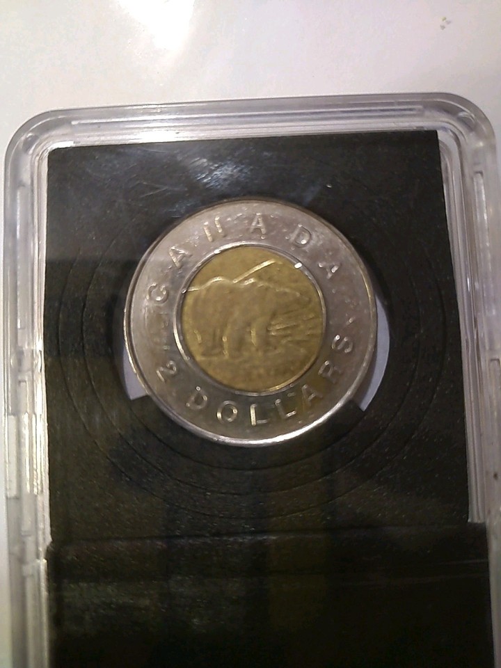 RARE MINTING ERROR 1996 CANADA $2 COIN. OFF CENTRE PLANCHET STRIKE ...