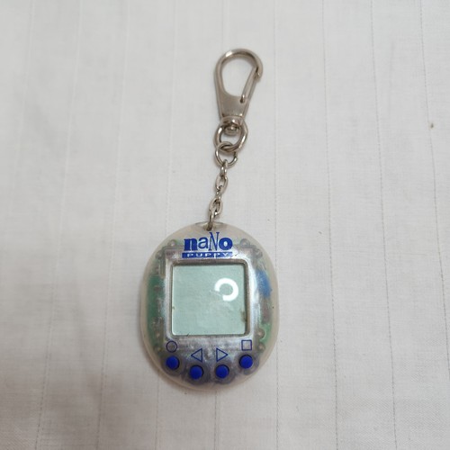 VINTAGE Nano Puppy Virtual Pet - Not Tested - 1997 Clear Case Shell ...