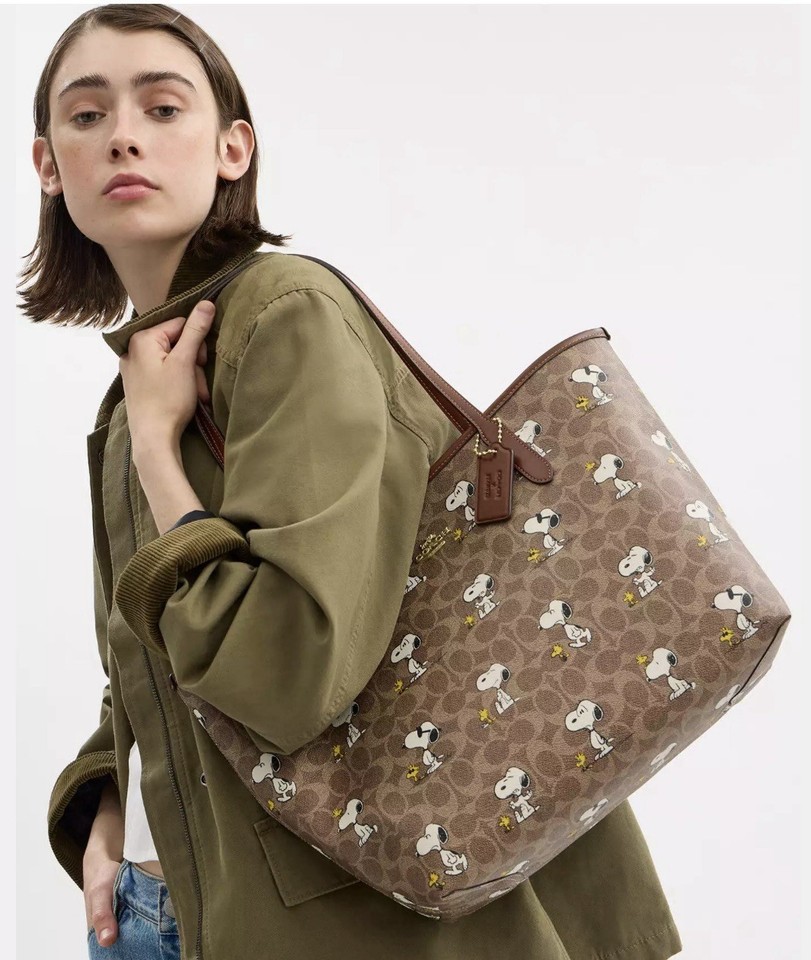 Peanuts x Coach Outlet City Tote Bag Signature Canvas Snoopy Print ...