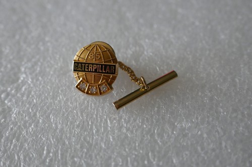 Pin's pins CATERPILLAR en OR avec 3 brillants pour 35 années de service ...