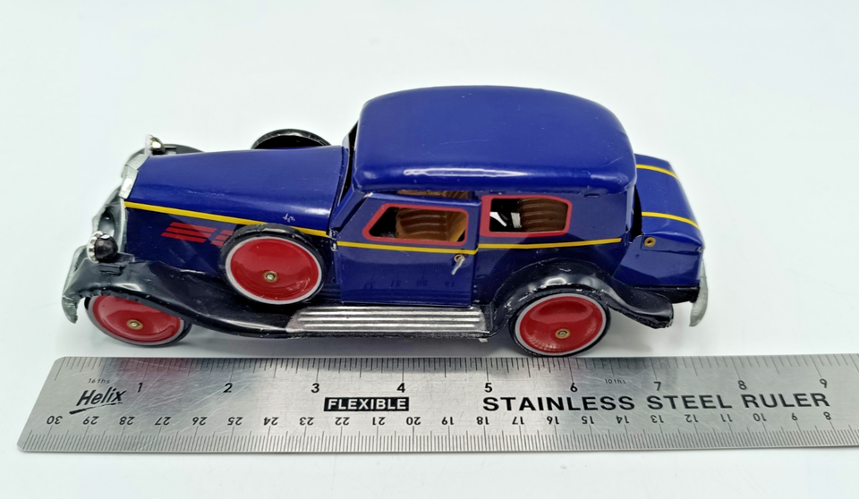 VINTAGE SUPERTOYS TINPLATE SEDAN CAR. CLOCKWORK/WIND UP. BLUE/RED. WITH ...