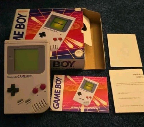 Original Gameboy In Box. Good condition . Minimal damage to Box ...