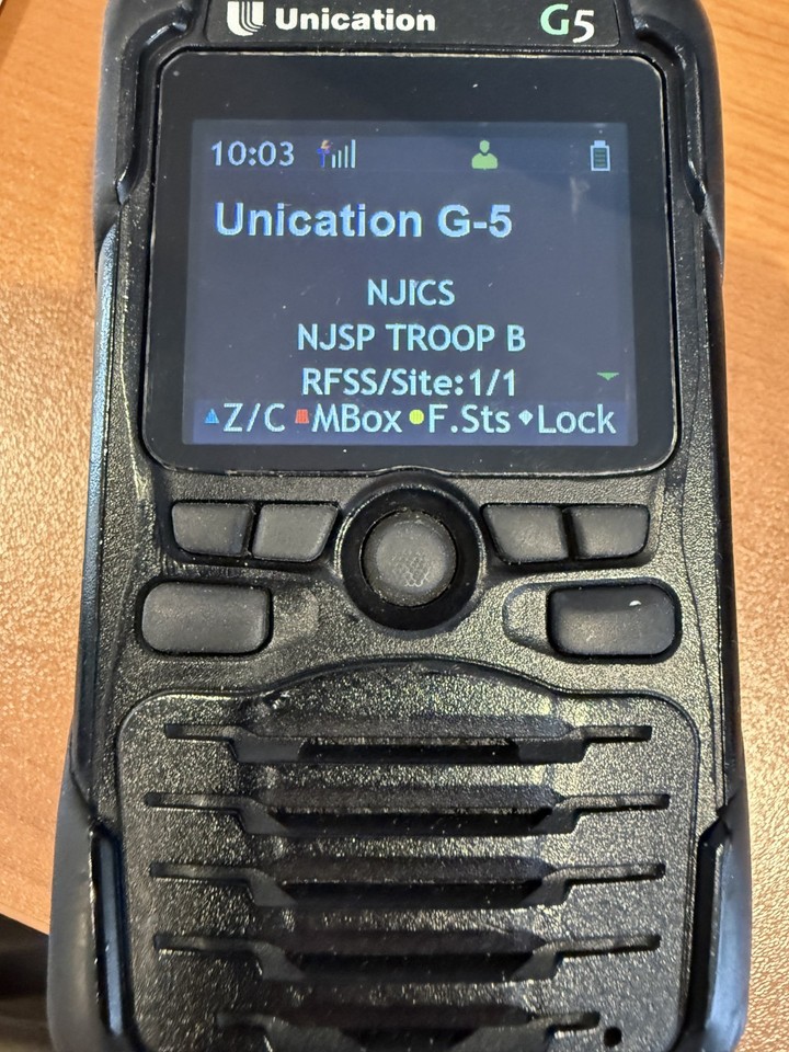 Unication G5 P25 UHF 450-520/700/800 Split D Pager and drop in charger ...