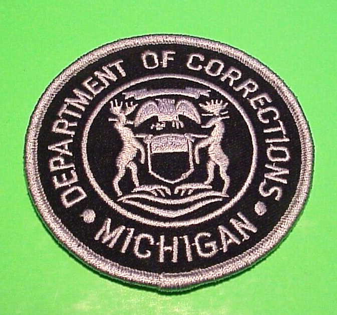Insignia Del Departamento De Correcciones De Michigan