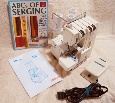 singer 14u32a overlock w/foot pedal,operator's guide,ABC's book by ...