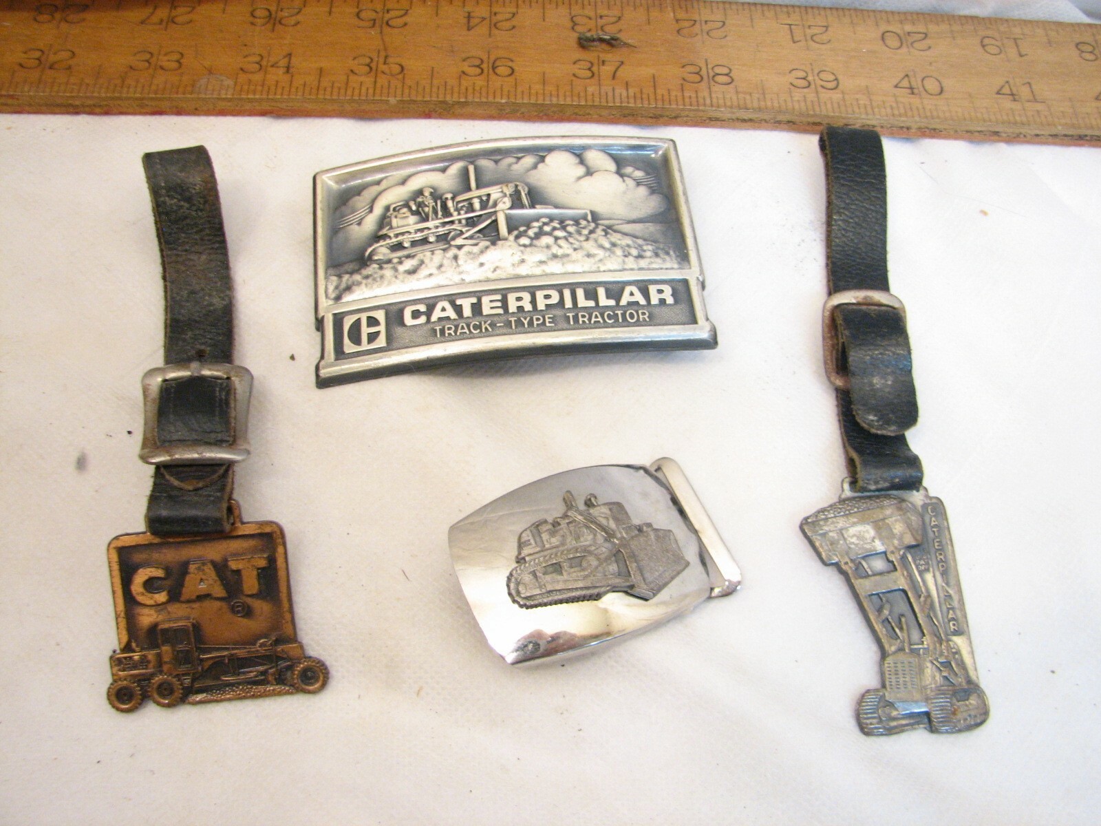 Caterpillar Vintage Watch Fobs and Belt Buckles Machinery Construction ...