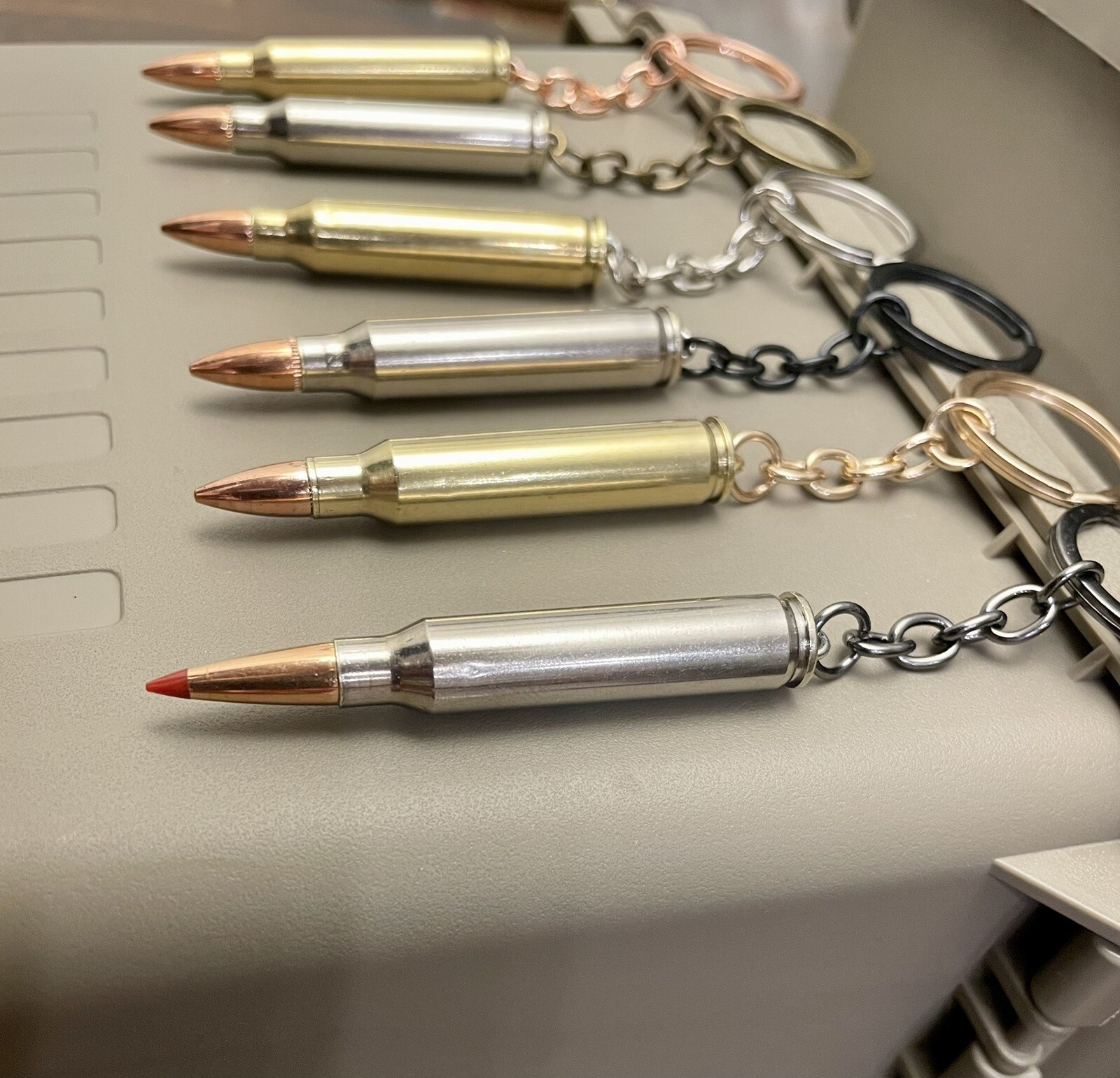 AUTHENTIC BULLET KEYCHAIN. 5.56/223, 9mm - requests available READ ...