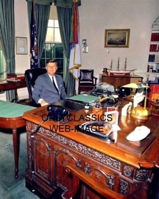 PRESIDENT JOHN F KENNEDY AT THE WHITE HOUSE OVAL OFFICE RESOLUTE DESK ...
