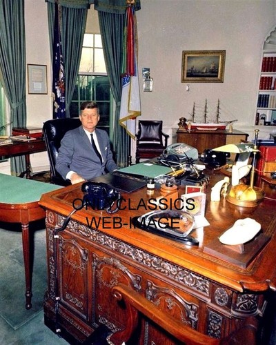 PRESIDENT JOHN F KENNEDY AT THE WHITE HOUSE OVAL OFFICE RESOLUTE DESK ...