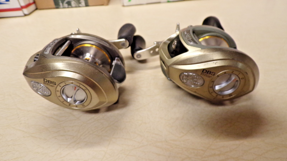 2 - BASS PRO SHOPS FISHING REELS - PRO QUALIFIER ( 7:1:1 & 6:4:1 GEAR ...