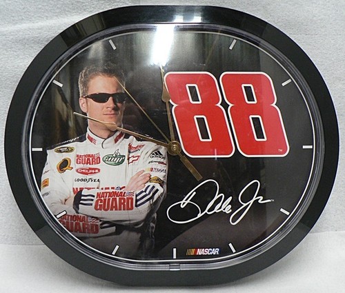 NEW PLASTIC OVAL DESIGN DALE EARNHARDT JR CLOCK IN ORIGINAL BOX AS IS ...