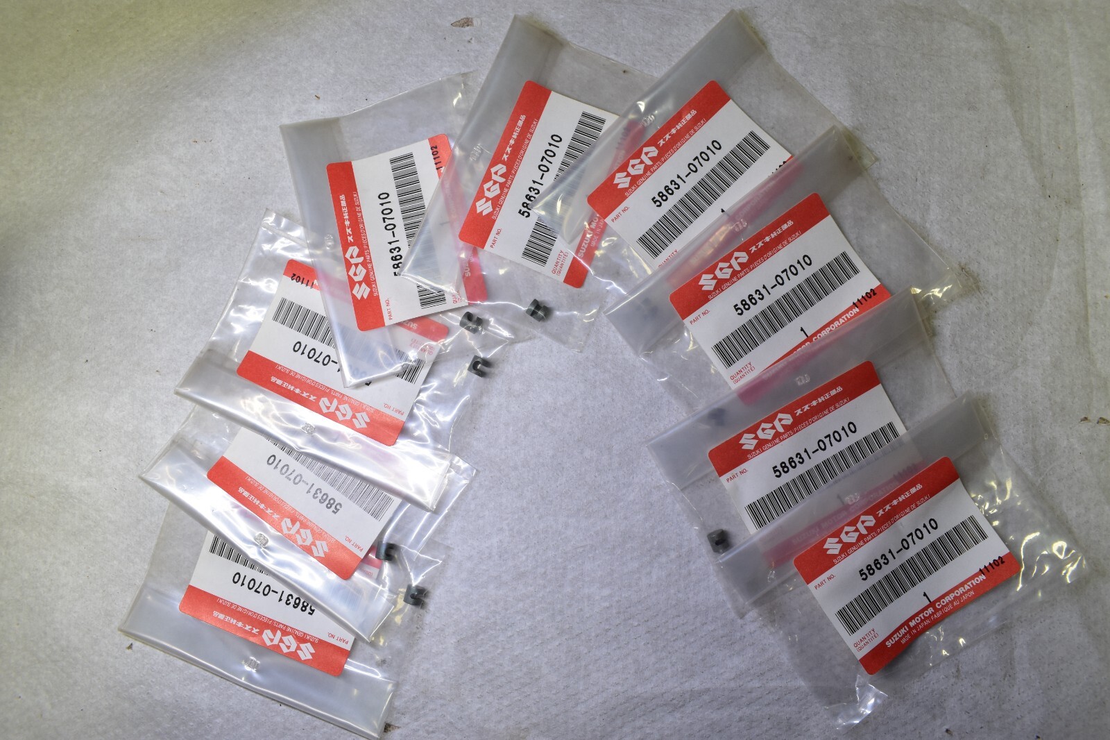 New Suzuki OEM End Piece 58631-07010 QTY of 9 Piece, End | eBay
