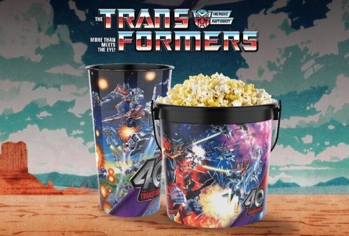 Transformers 40th anniversary plastic popcorn bucket, and cup in hand ...