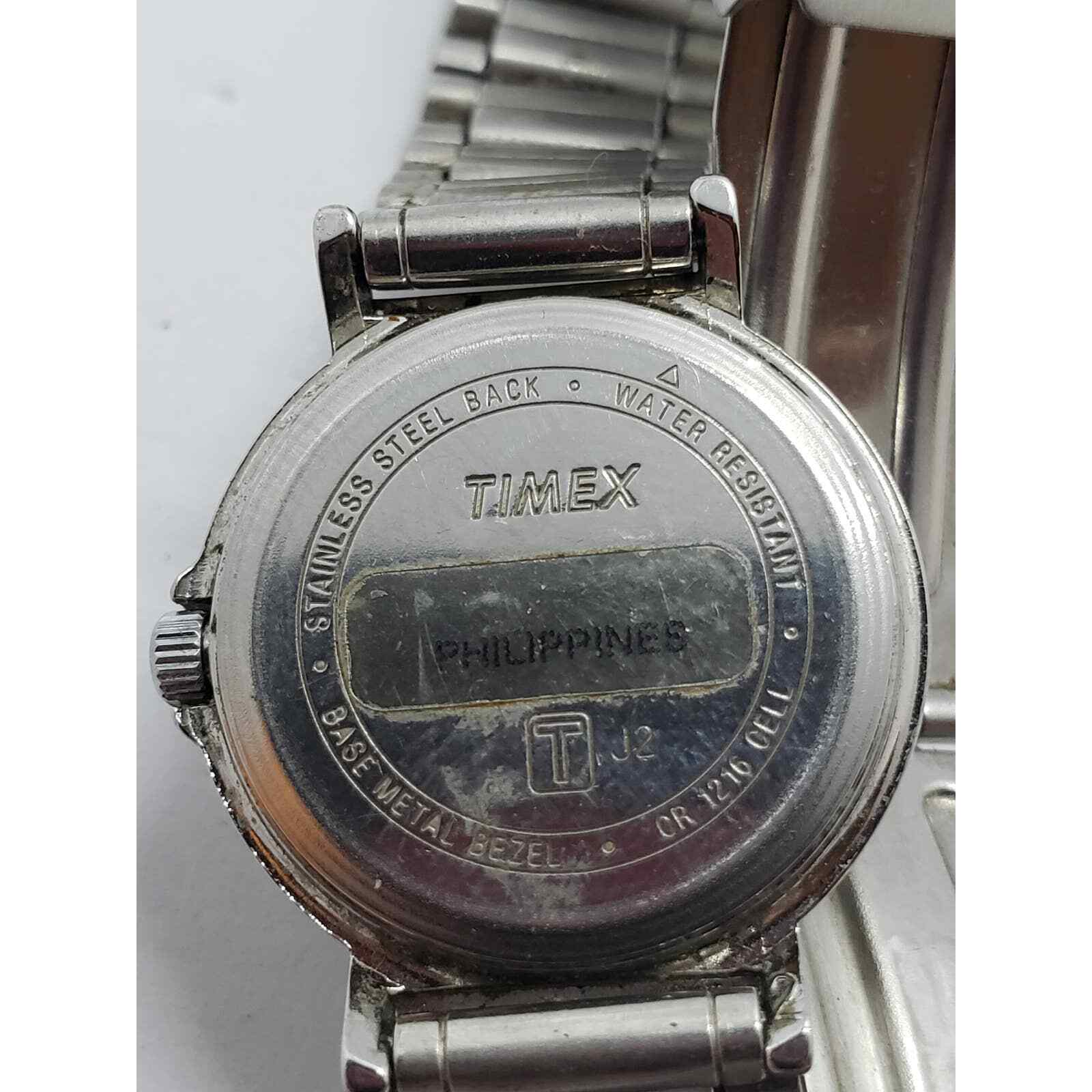 Women's Carriage by Timex watch. Indiglo. Dark blue face. Silver band ...