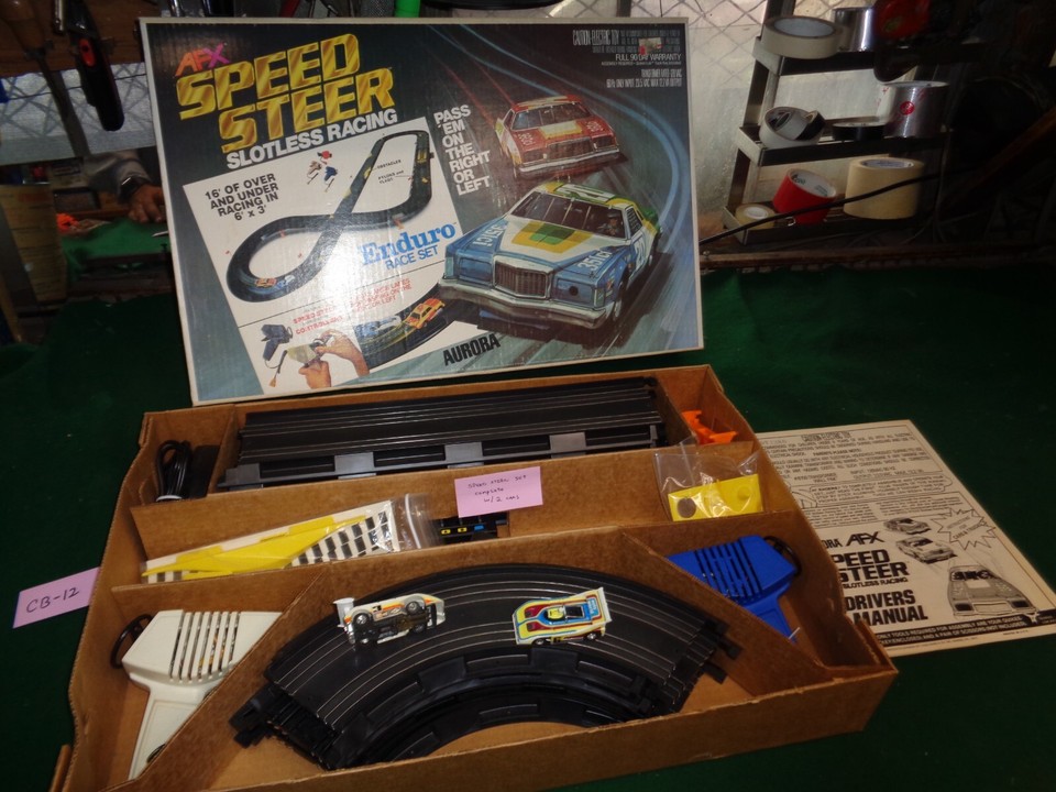 1979 Aurora AFX Road Blocker Speed Steer Slotless Race Car Set | eBay