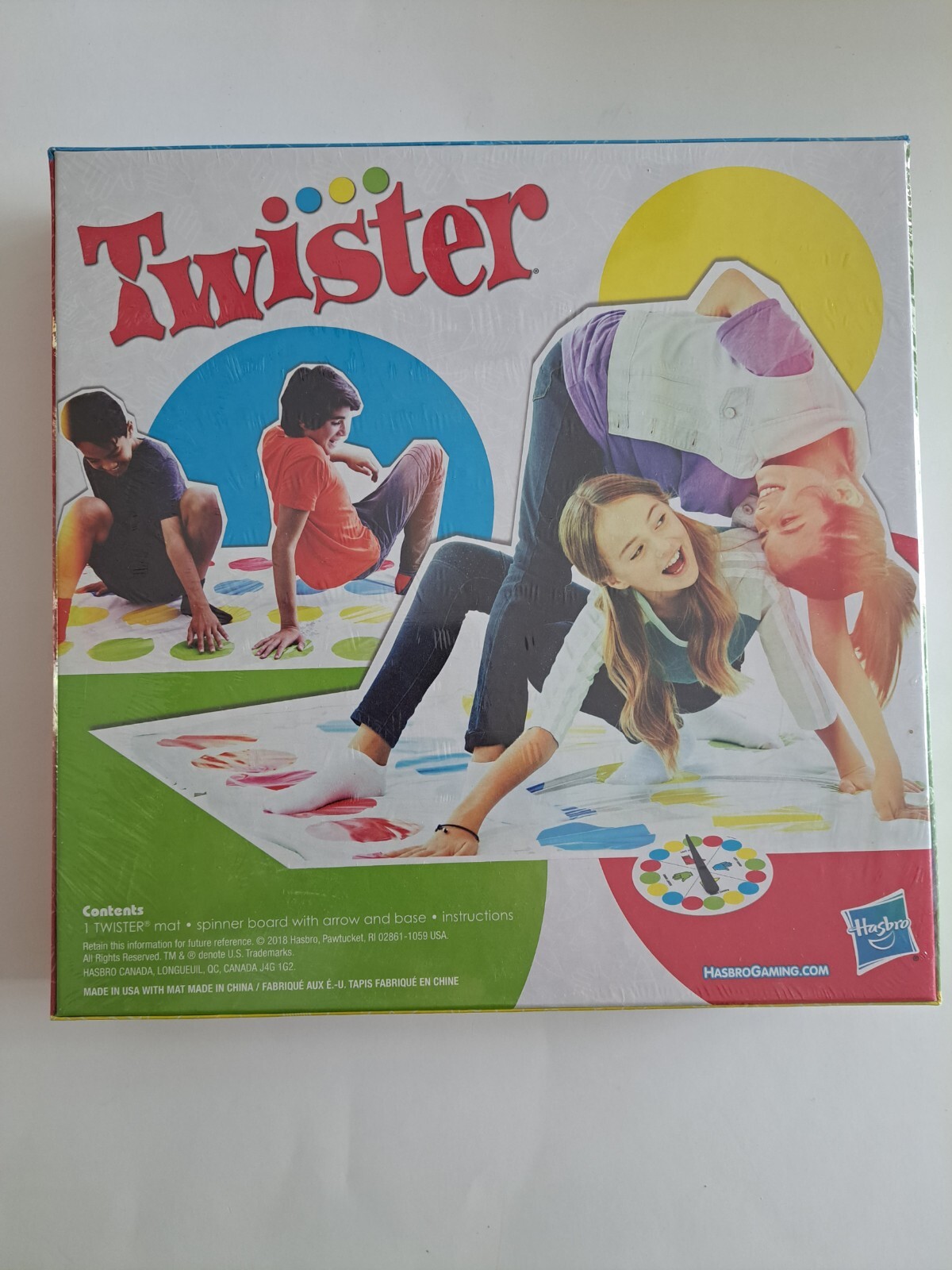 TWISTER The Classic Game That Ties You Up in Knots 2 or more players ...