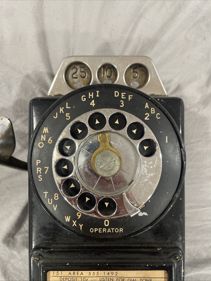 Vintage Automatic Electric Company rotary dial payphone with three coin ...